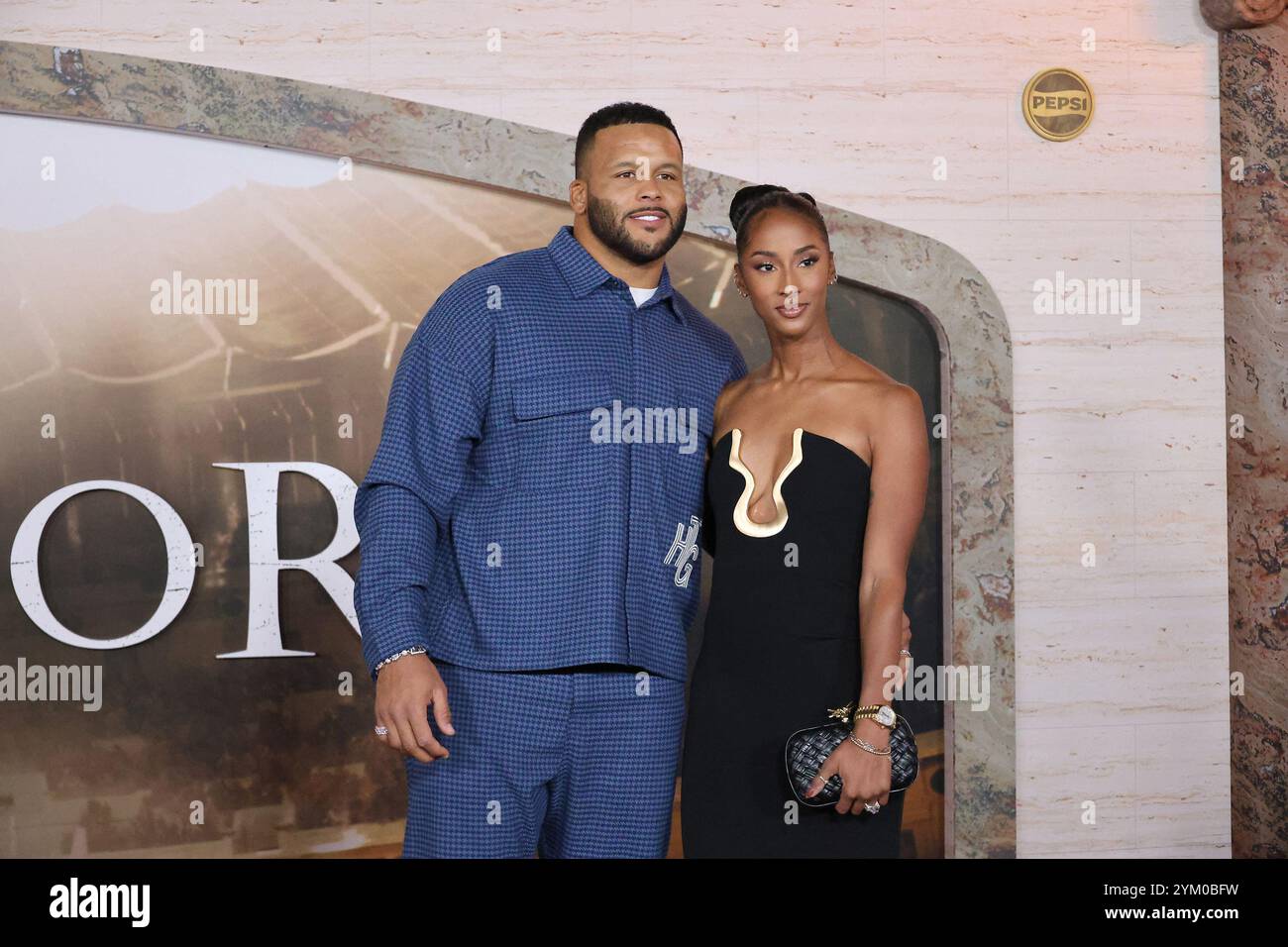 November 18, 2024, Los Angeles, California, USA: Aaron Donald, Erica ...