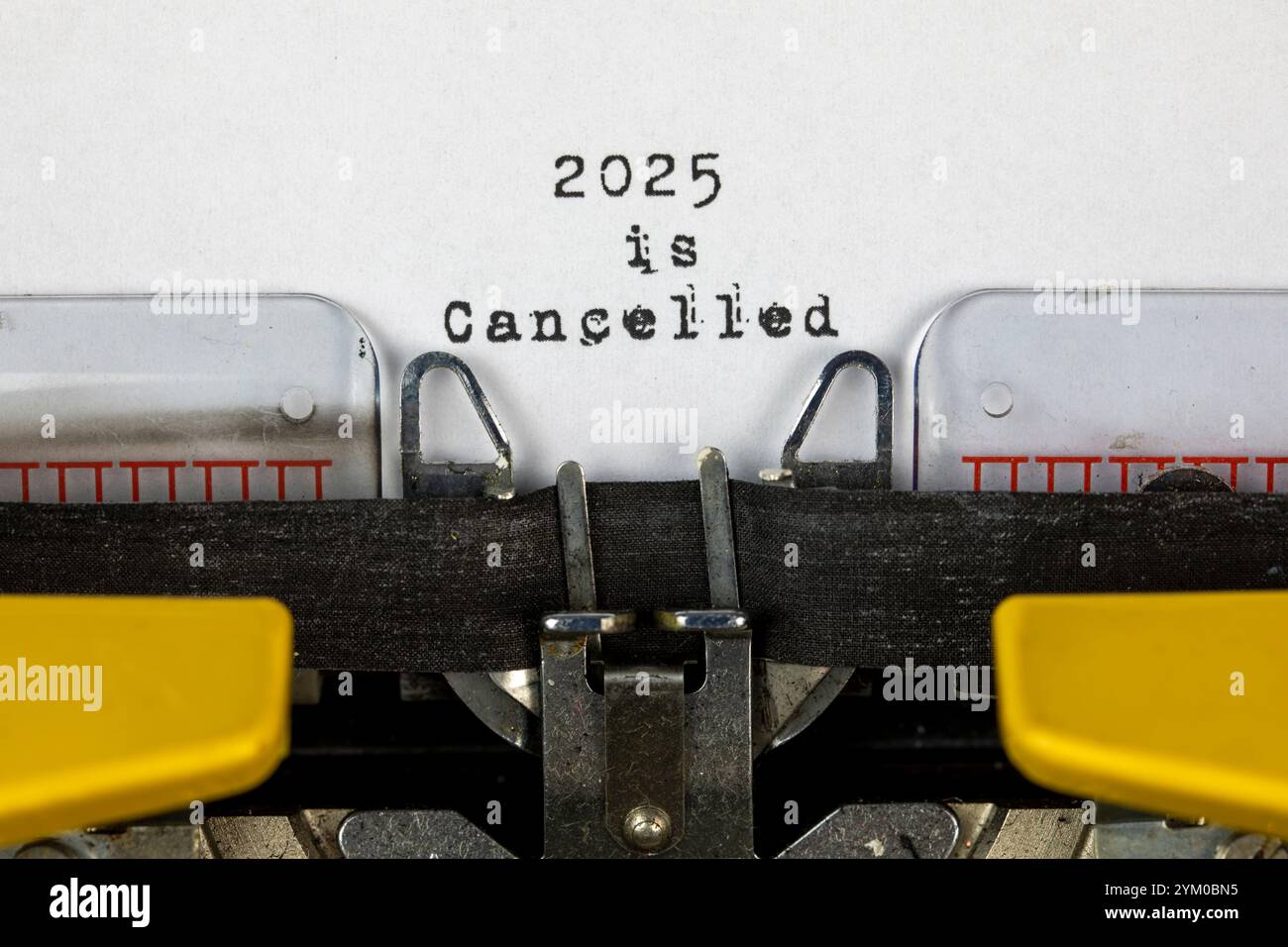 written on old typewriter with text 2025 is cancelled. pandemic or ...