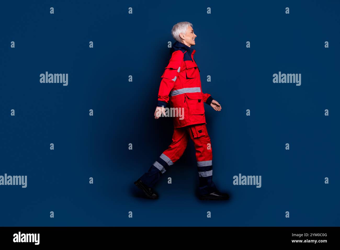 Full body photo of nice senior woman profile walking wear uniform ...