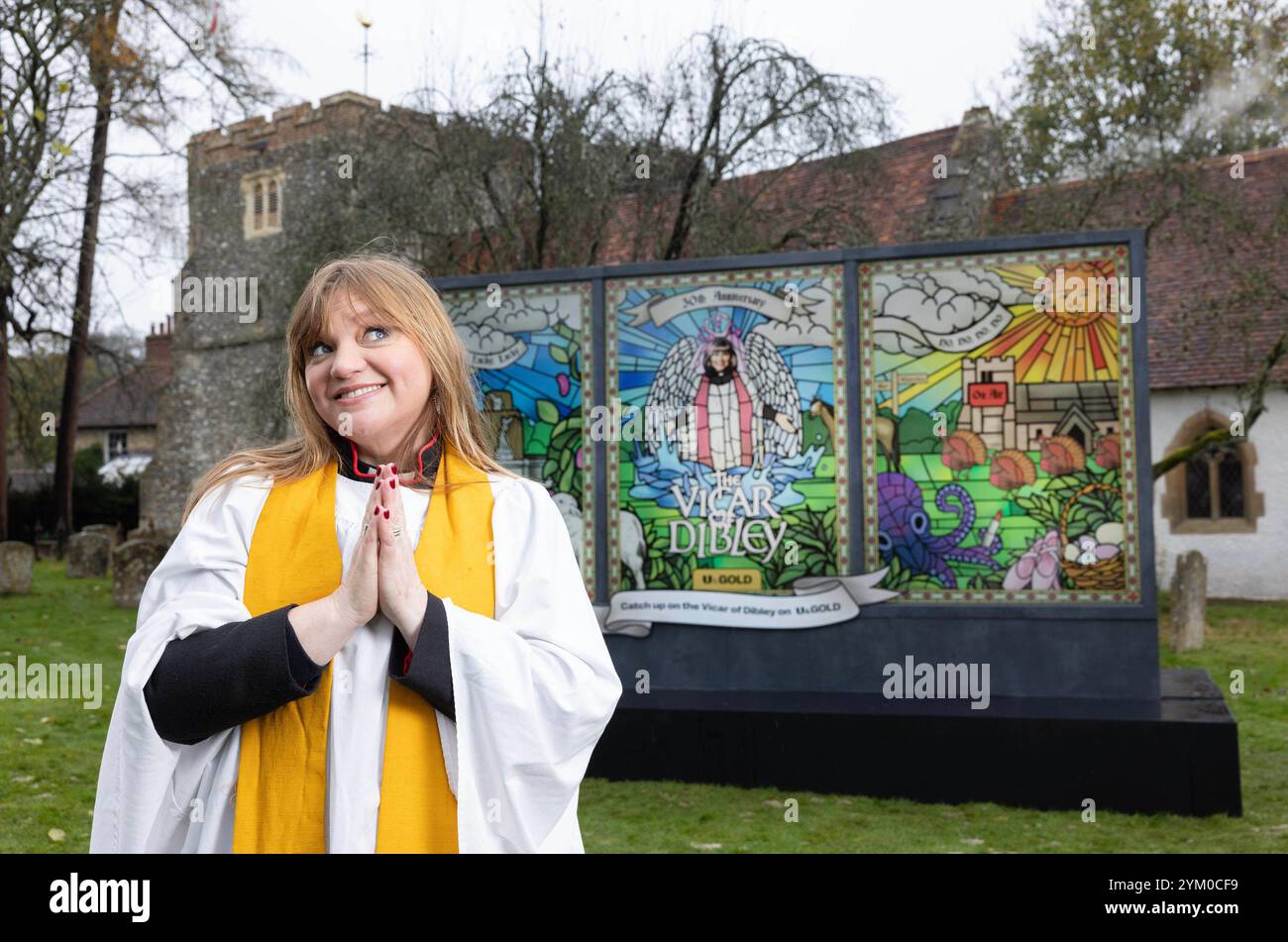 EDITORIAL USE ONLY The Reverend Kate Bottley unveils a stained-glass ...