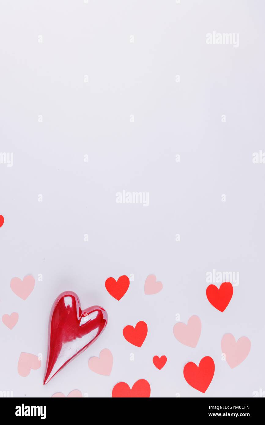 A delightful collection of red and white porcelain hearts is showcased ...