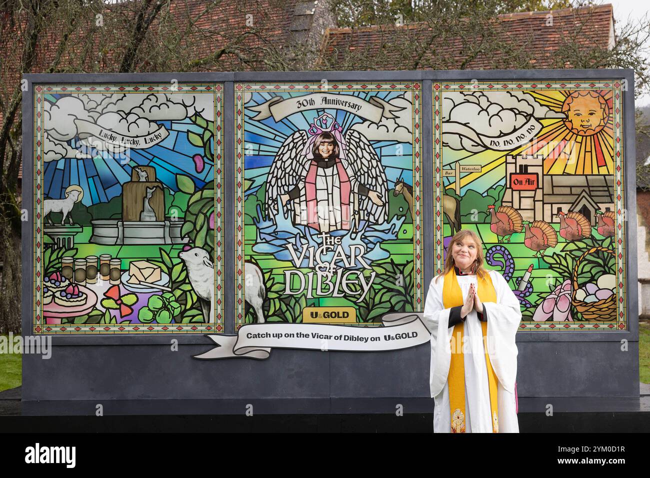 EDITORIAL USE ONLY The Reverend Kate Bottley unveils a stained-glass ...