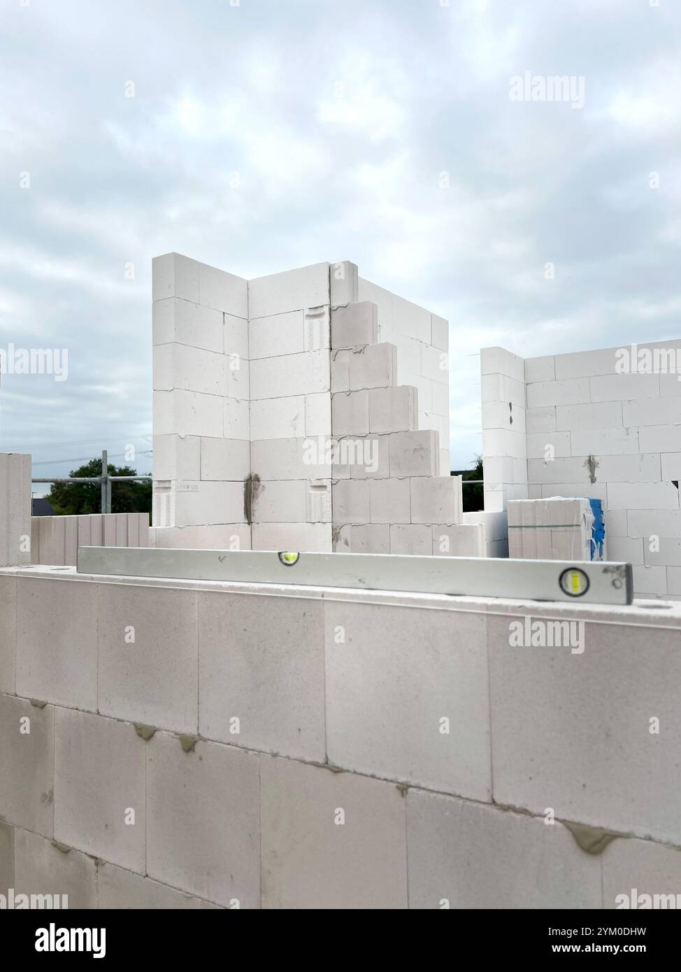 White cement block walls at a construction site. German house building ...