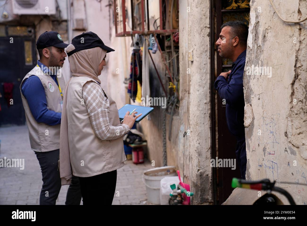 Workers prepare to collect information from the public as Iraq began ...