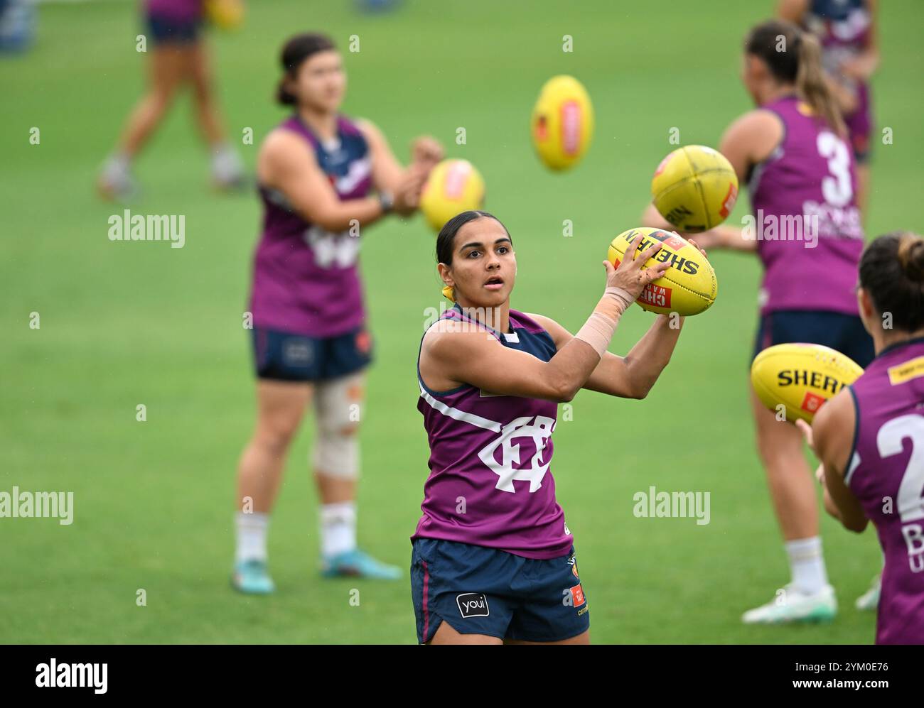 Brisbane, Australia. 20th Nov, 2024. Courtney Hodder (centre) of the ...