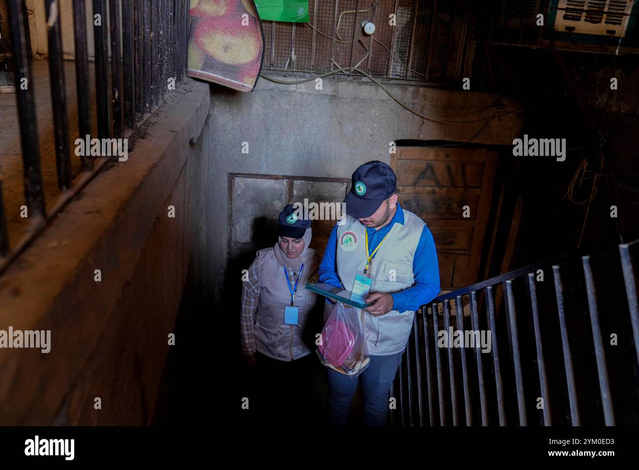 Workers prepare to collect information from the public as Iraq began its first nationwide ...