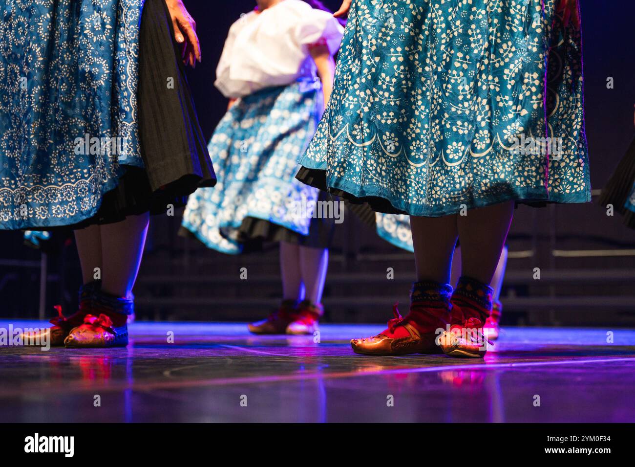 Legs of dancers in traditional Polish costumes Stock Photo - Alamy