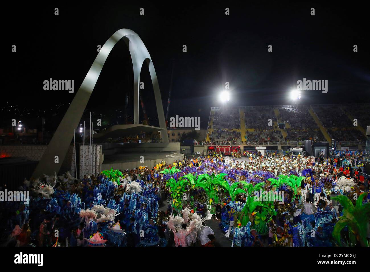 Rio De Janeiro, Rj, Brazil. 13th Feb, 2024. Revellers pass through the ...
