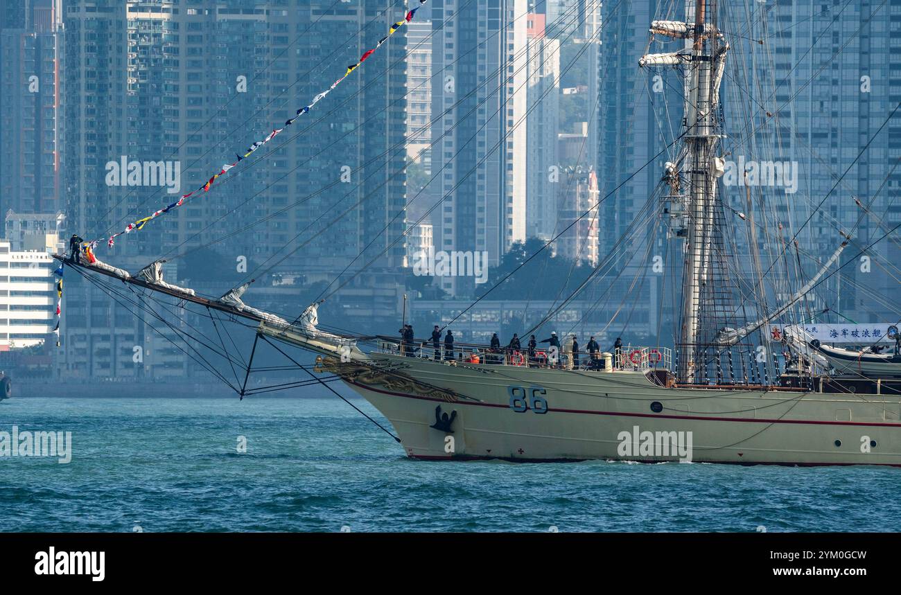 The 'Breaking Waves' sails towards the anchorage. Hong Kong,China.18th ...