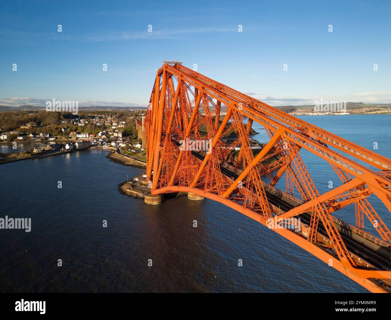 Aerial view from drone of the Forth Bridge (rail bridge) crossing Firth of Forth at North ...