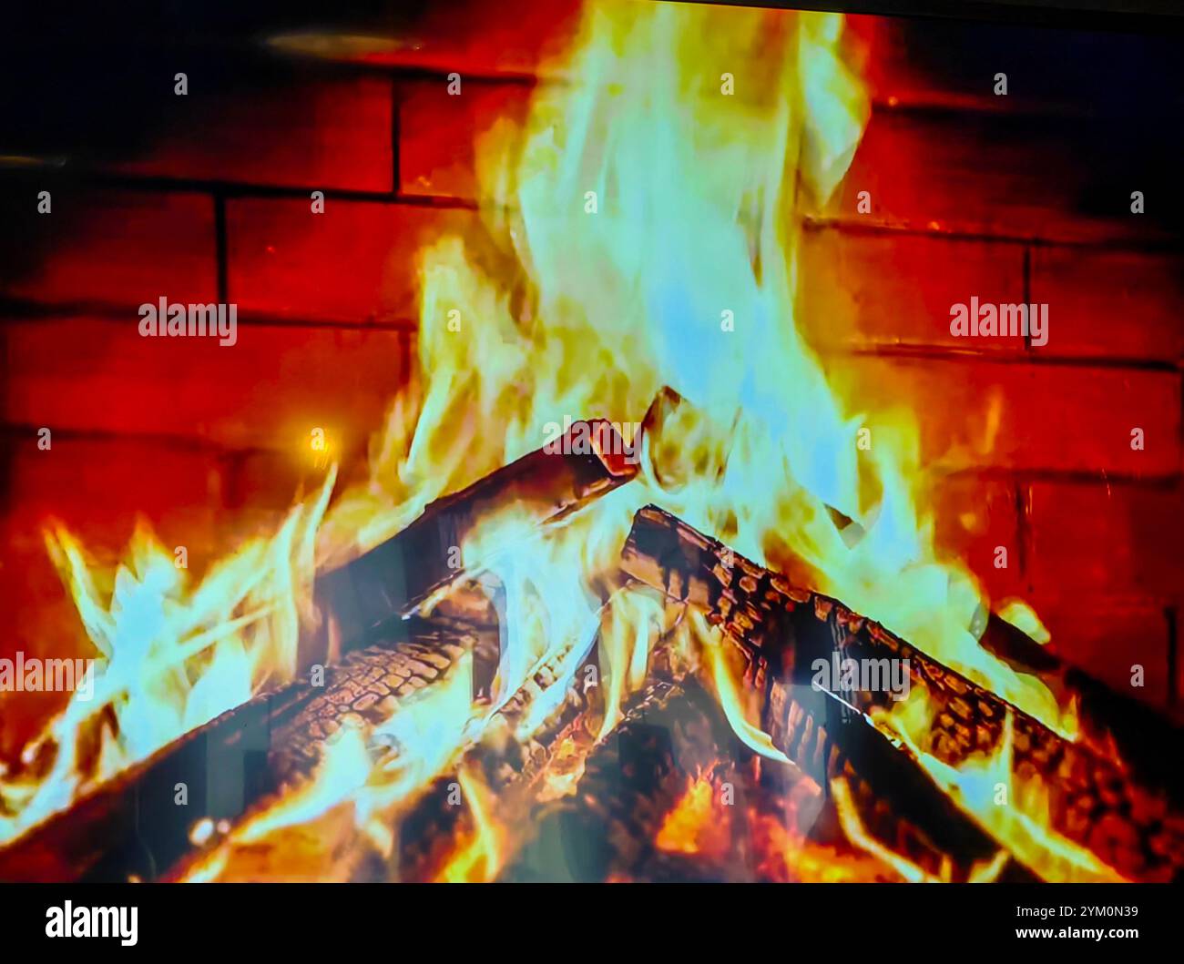 Abstract Flame Display on TV: Fireplace Improvisation for Winter Warmth ...