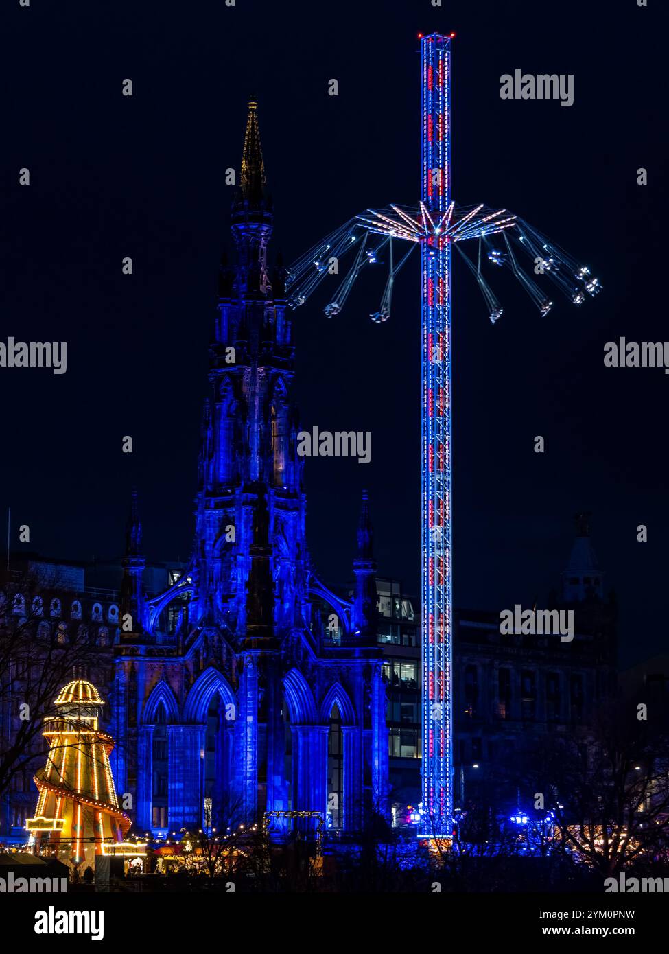 Christmas star flyer fairground rides and Scott monument on Princes ...