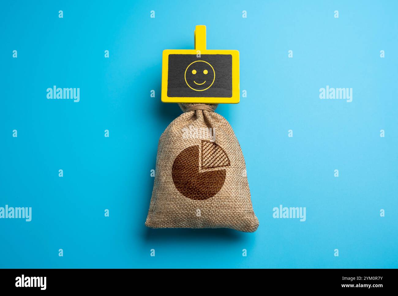Money bag with budget and smiling smiley face. Budget surplus, balance ...