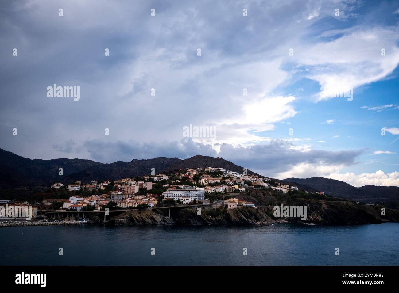 The seaside resort and the Pyrenees mountains seen from Cap Cerbere on ...