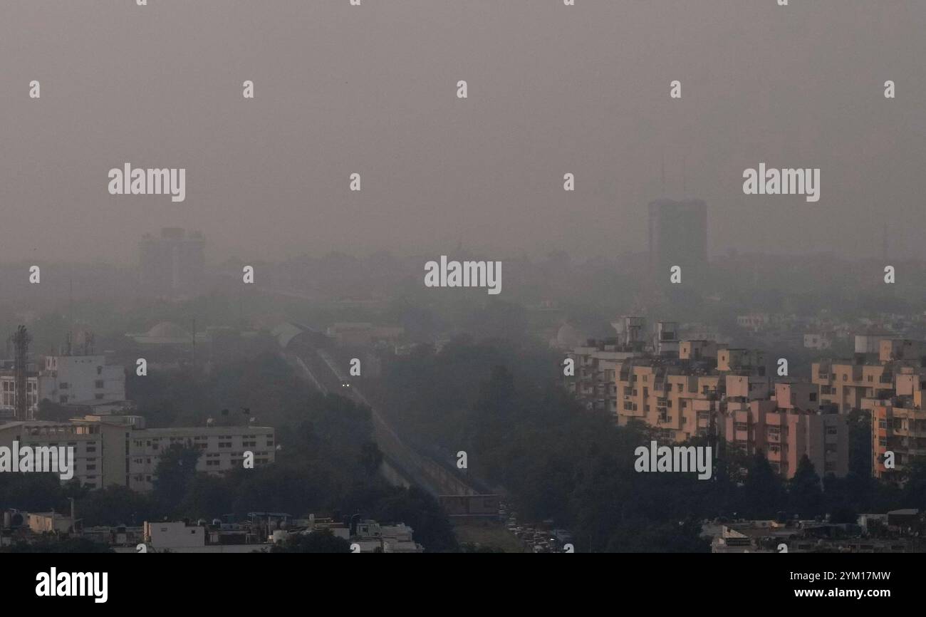 A thick layer of smog envelops the sky as air pollution shot up to its ...