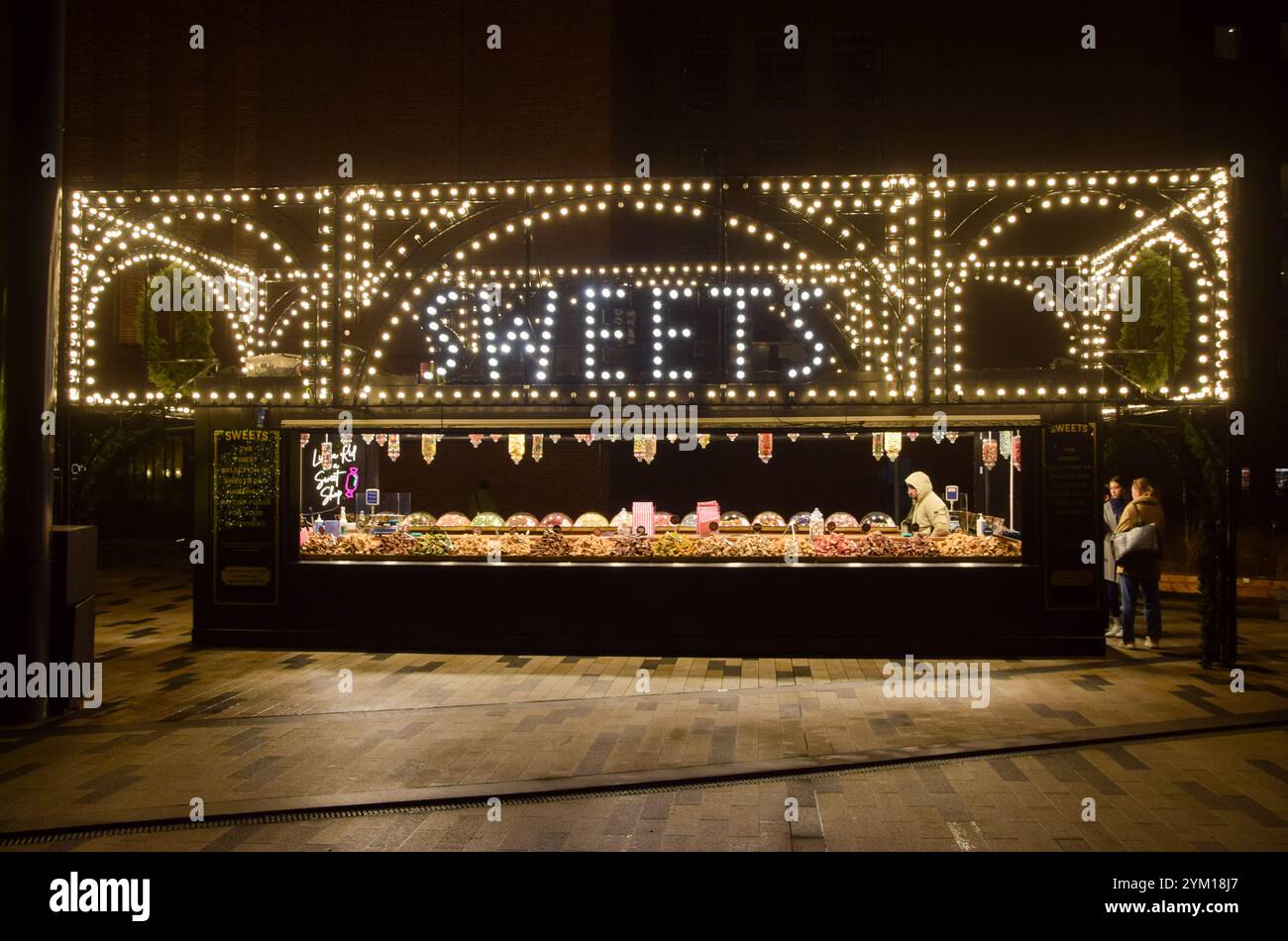 London, UK. 19th November 2024. A Christmas sweets stall outside ...