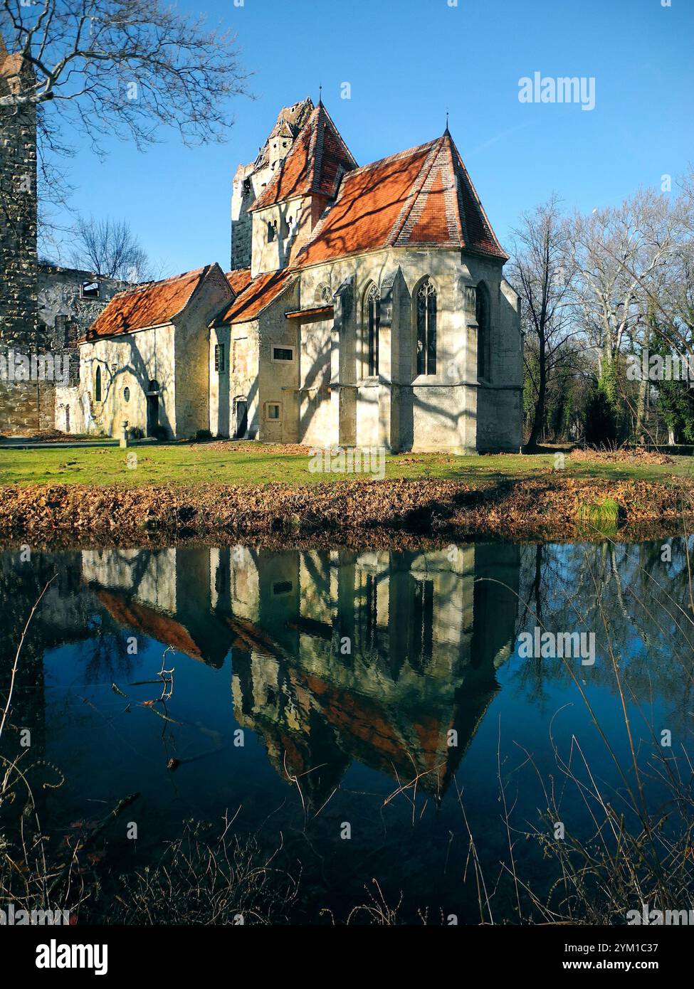 Pottendorf, Austria - January 21, 2024: Moated castle with partially ...