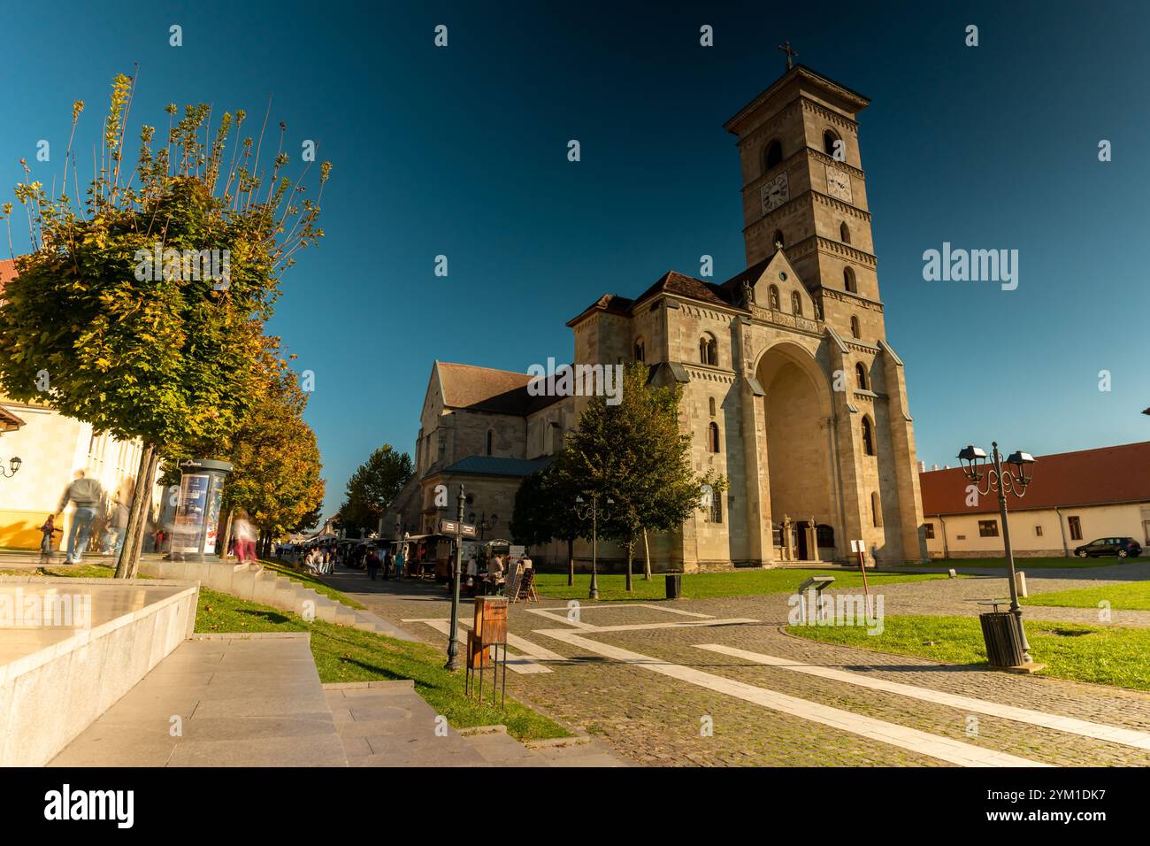 Alba Iulia, Romania - October 20, 2024: Str. Mihai Viteazul street view. Saint Michael Cathedral ...