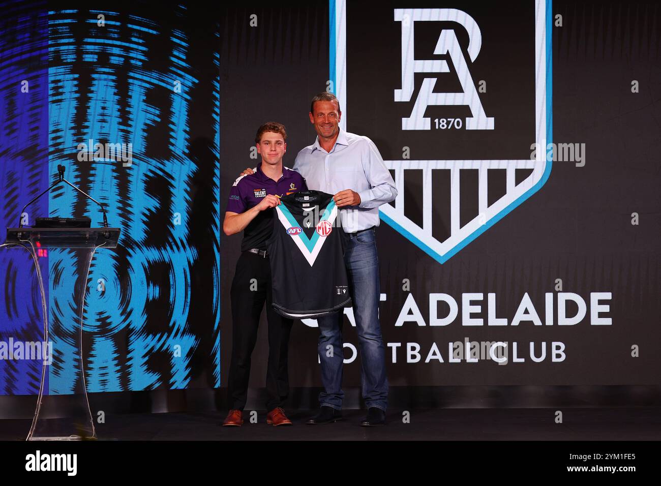 Melbourne, Australia. 20th Nov, 2024. Joe Berry is presented with a ...