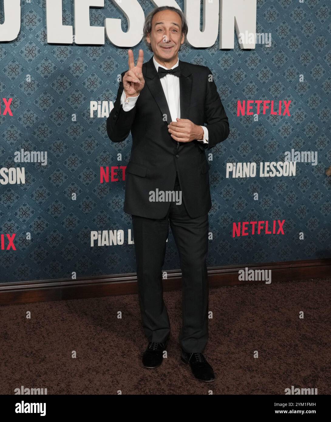 Alexandre Desplat arrives at Netflix's THE PIANO LESSON Premiere held ...