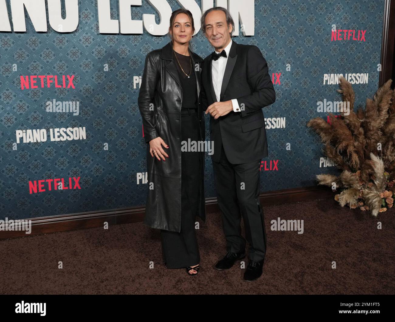 (L-R) Antonia Desplat and Alexandre Desplat at Netflix's THE PIANO ...