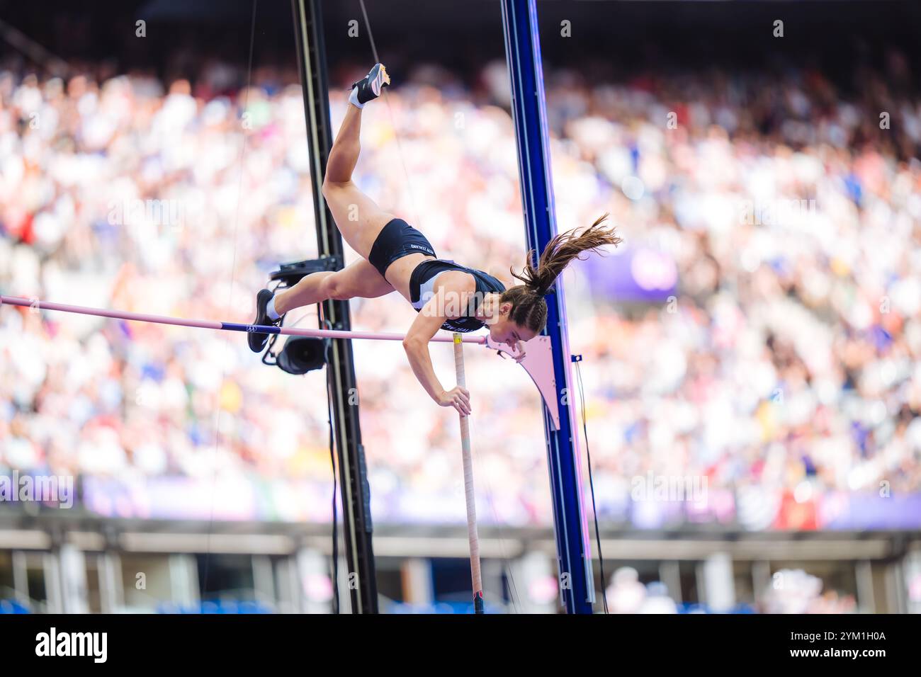 Imogen Ayris participating in the pole vault at the Paris 2024 Olympic ...