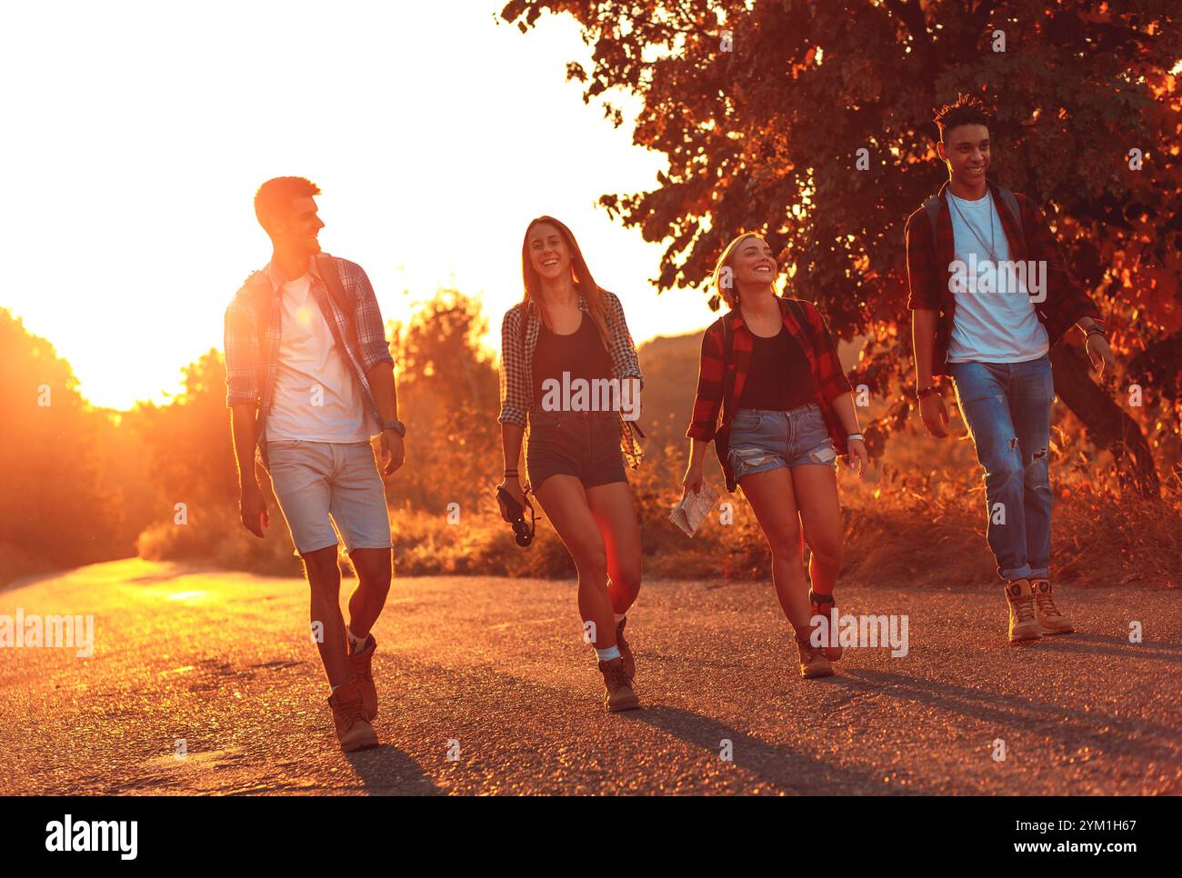 Group four hikers walking through hi-res stock photography and images ...