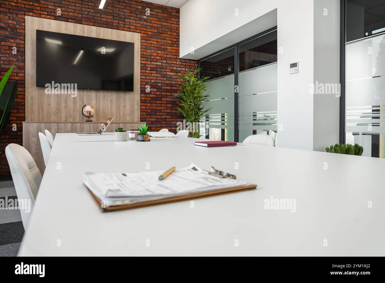 Modern Conference Room With Large Windows and Flat Screen TV Stock ...