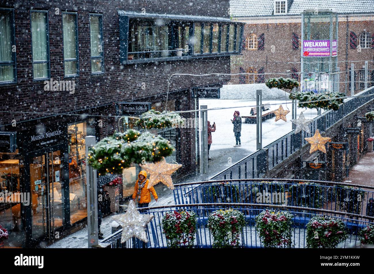 Nijmegen, Netherlands. 20th Nov, 2024. People are seen trying to walk ...
