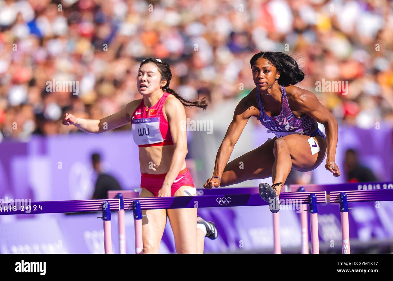Alaysha Johnson participating in the 100 meters hurdles at the Paris ...