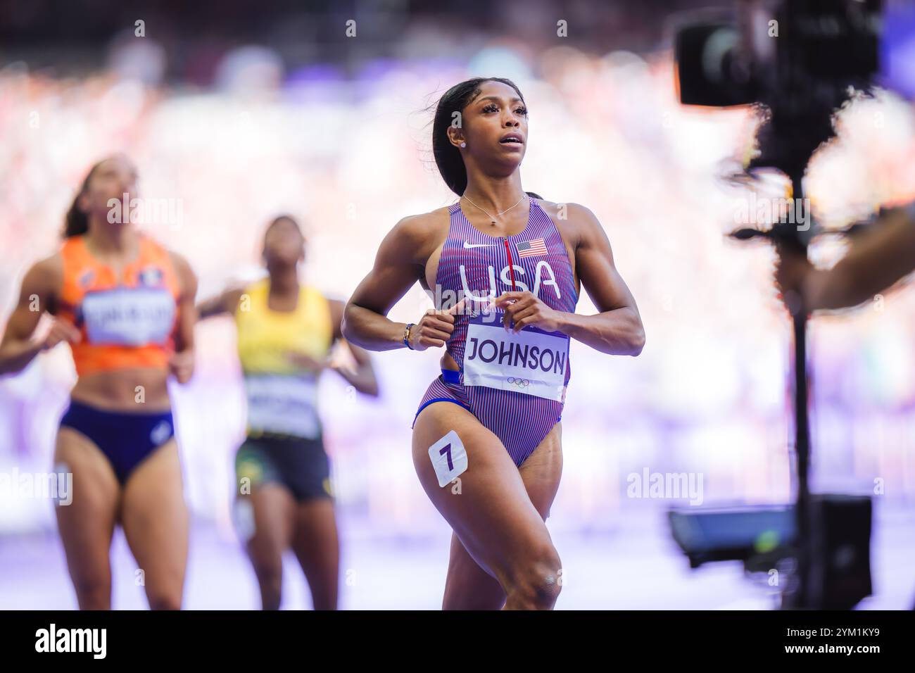 Alaysha Johnson participating in the 100 meters hurdles at the Paris ...