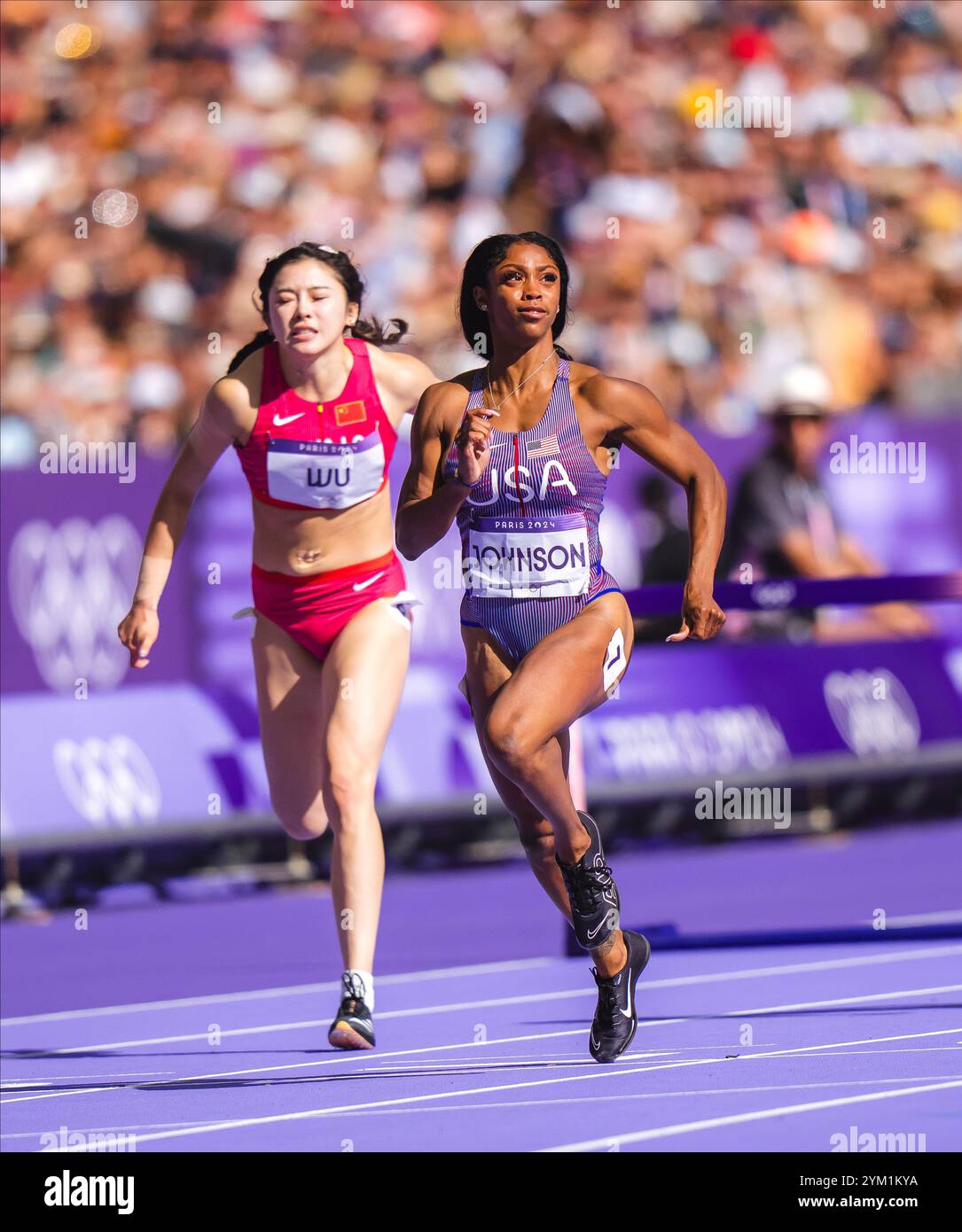 Alaysha Johnson participating in the 100 meters hurdles at the Paris ...