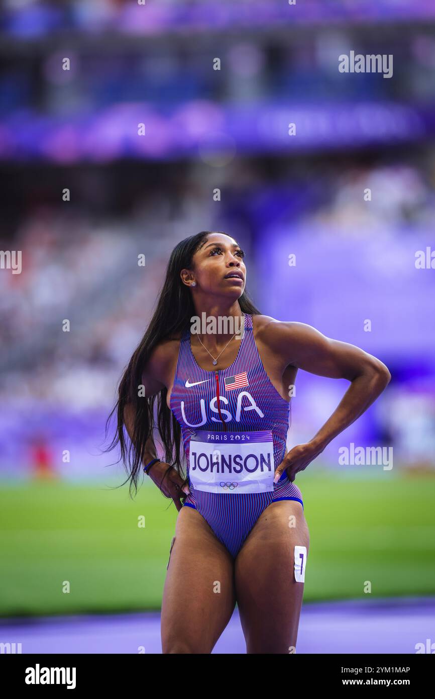 Alaysha Johnson participating in the 100 meters hurdles at the Paris ...