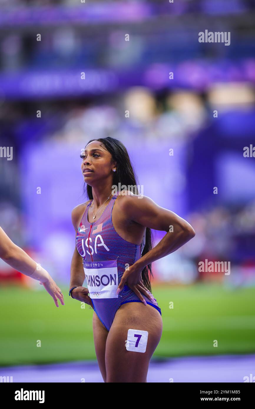 Alaysha Johnson participating in the 100 meters hurdles at the Paris ...