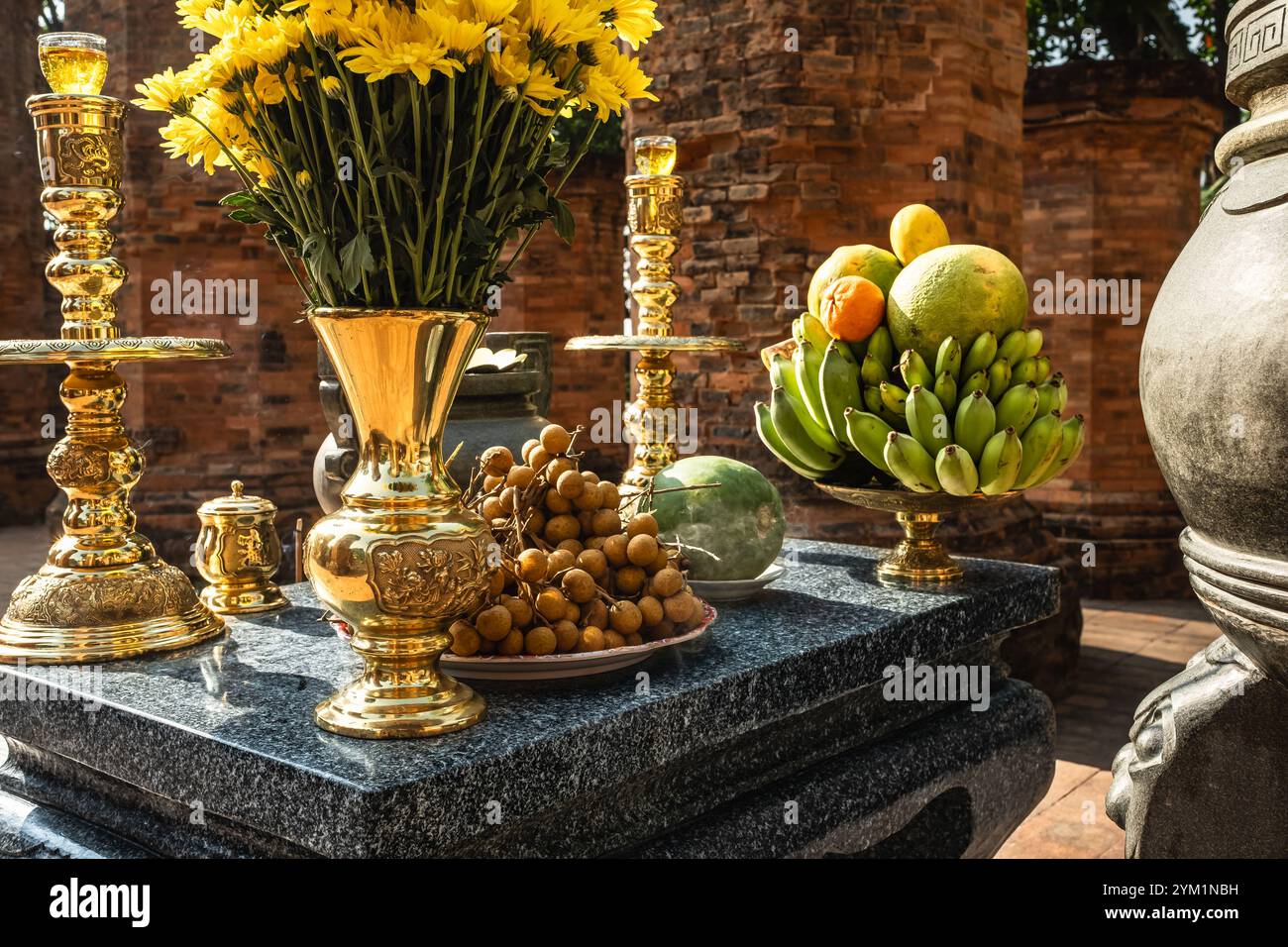 Fruit Offerings at a Thai Temple. An offering of fruit, flowers and ...