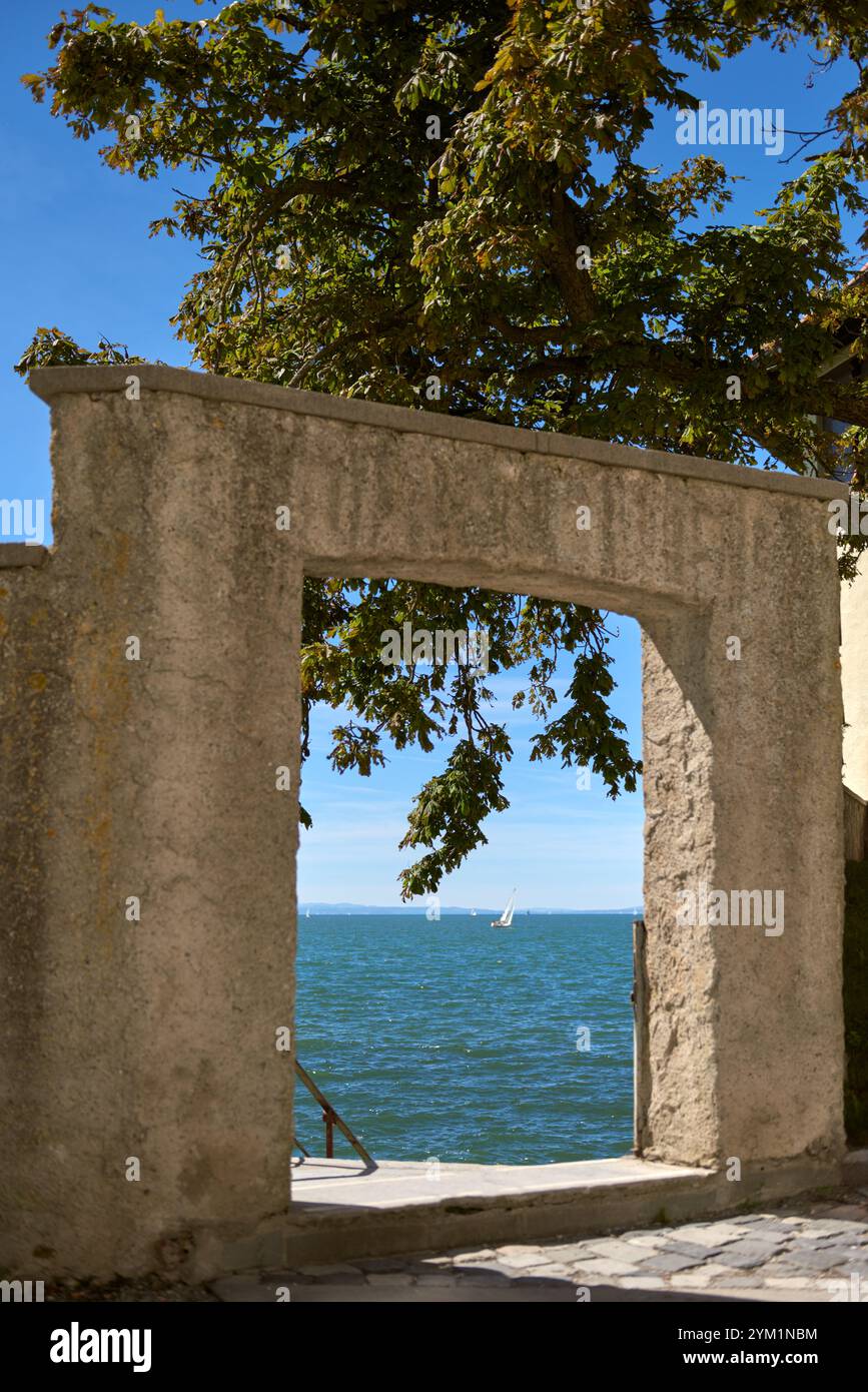 Picturesque View of Bodensee Through Medieval Castle Arch in Lindau ...