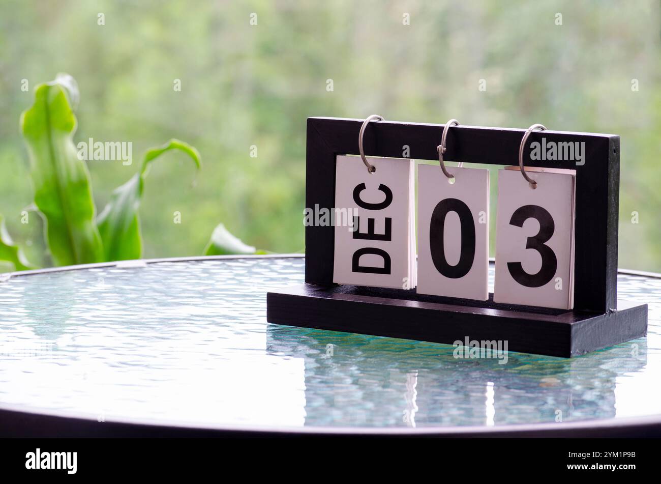 3 December calendar on marble table with customizable space for text ...