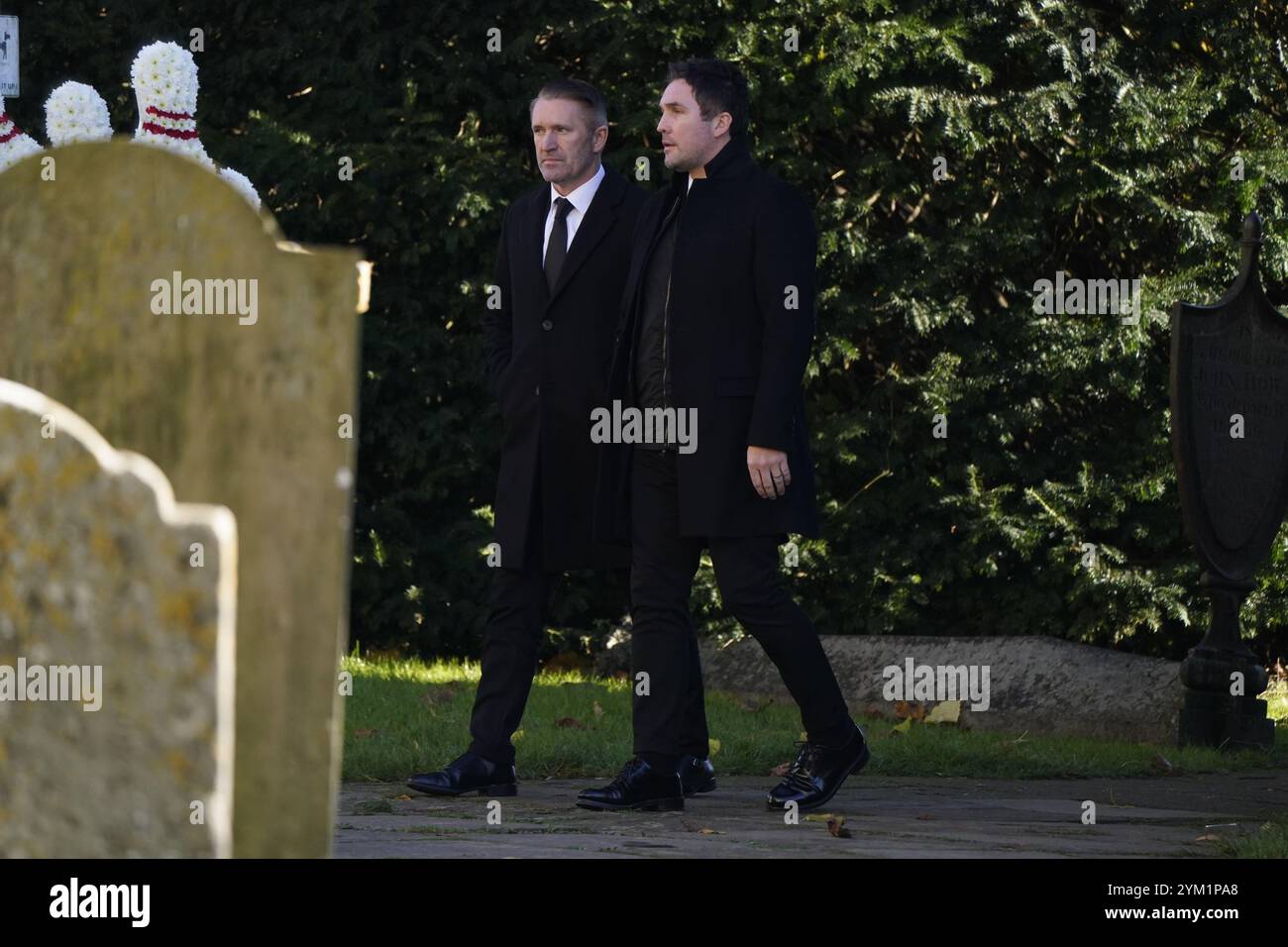 Robbie Keane (left) arrives for the funeral service of One Direction ...