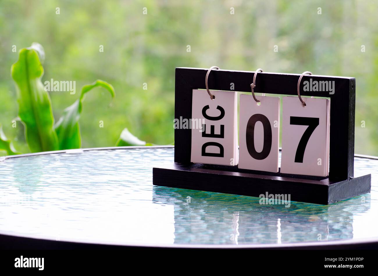 7 December calendar on marble table with customizable space for text ...