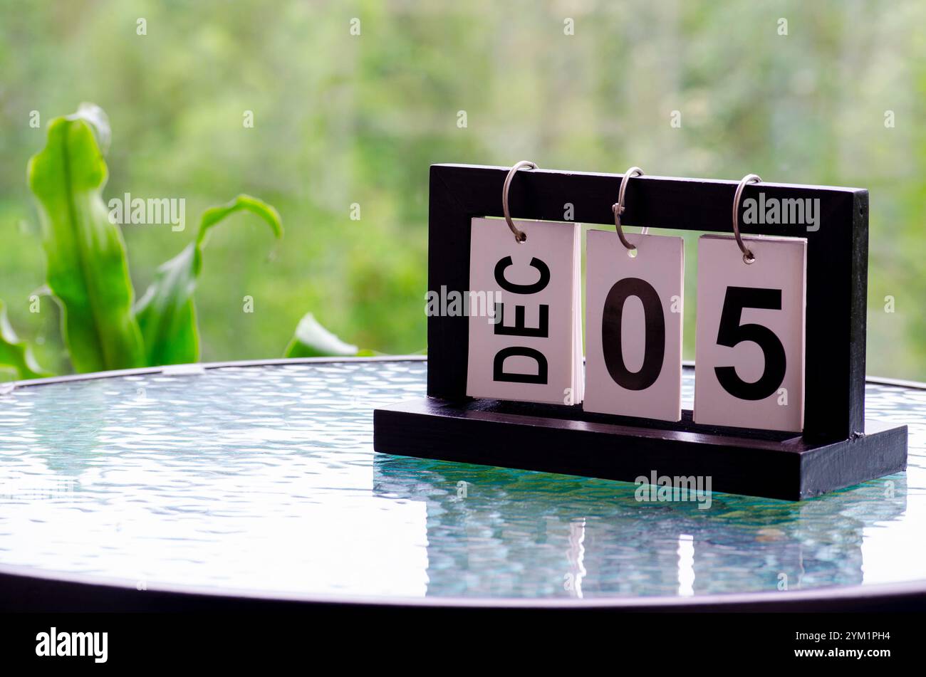 5 December calendar on marble table with customizable space for text ...