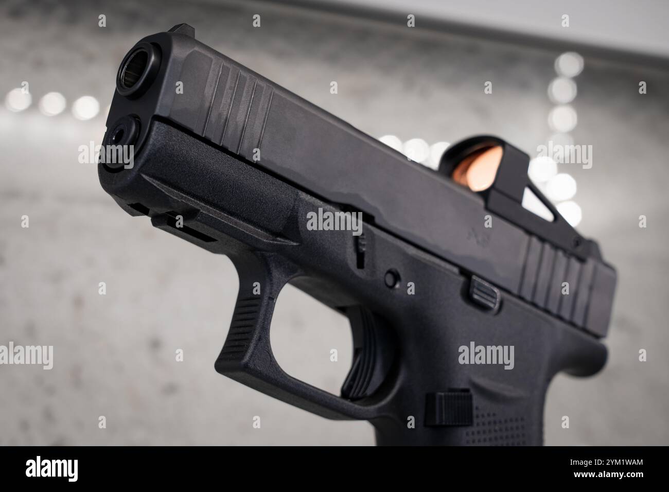 Modern compact 9mm pistol with red dot sight, close-up photo Stock ...
