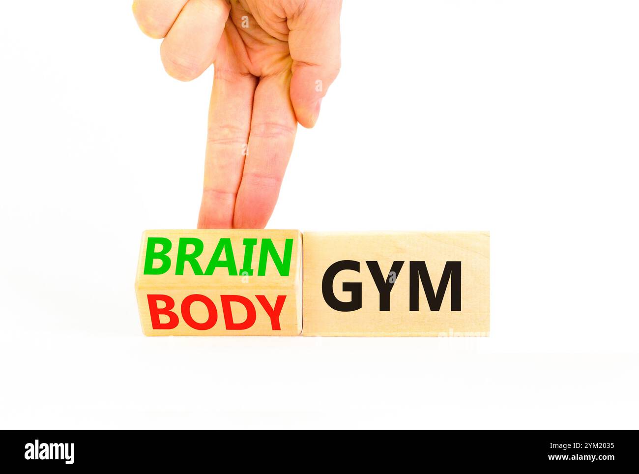 Body vs brain gym symbol. Businessman turns wooden cubes and changes ...