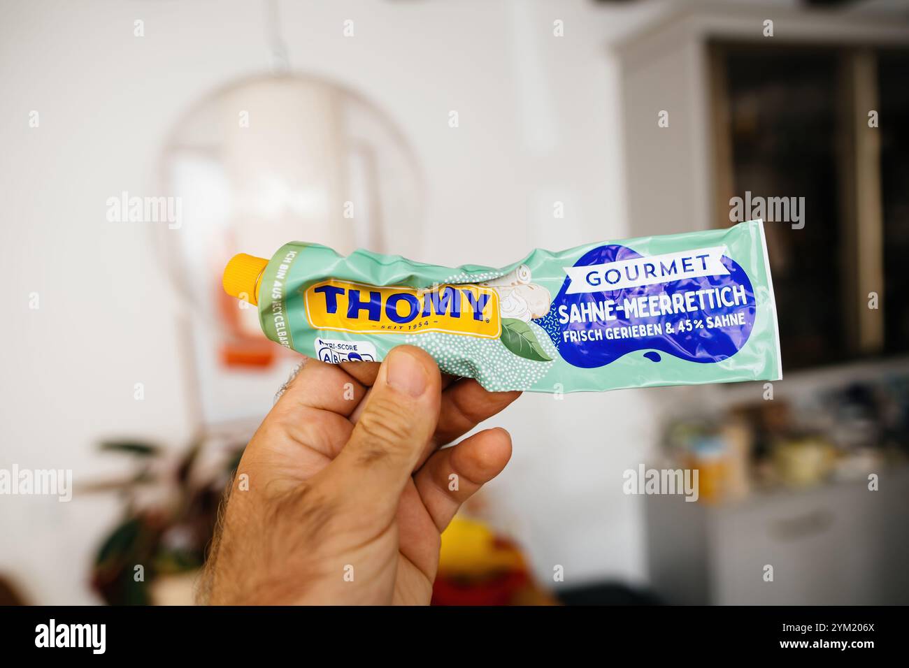 Paris, France - Sep 6, 2024: Hand holding a Thomy gourmet horseradish ...