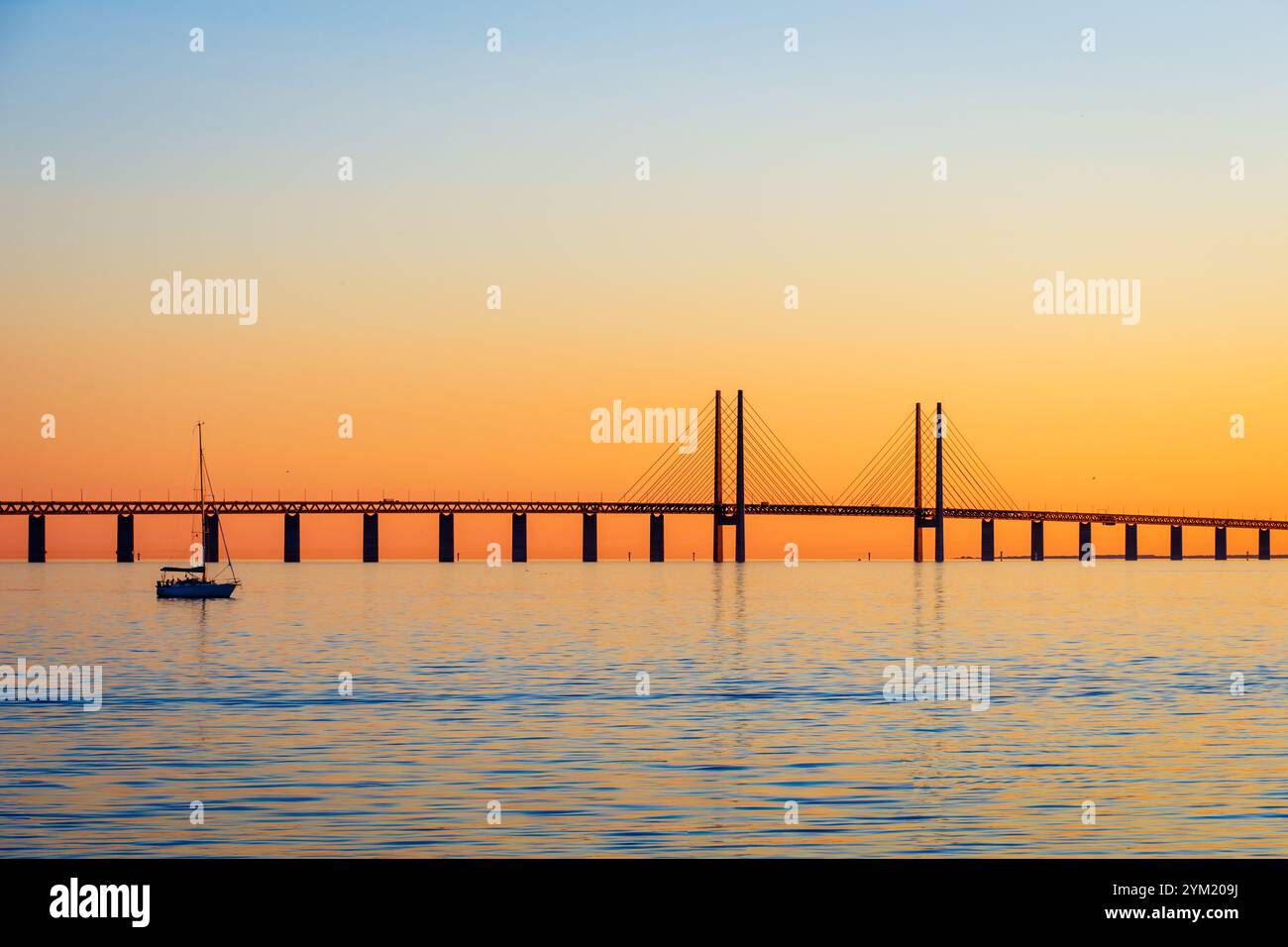 Sunset view of the Oresund bridge, a railway and motorway cable-stayed ...