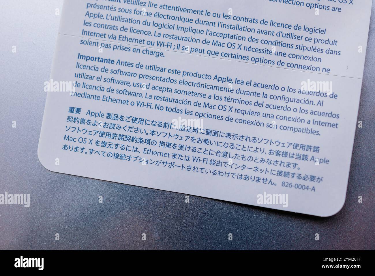 Paris, France - Jan 14, 2015: Multilingual Apple product notice ...