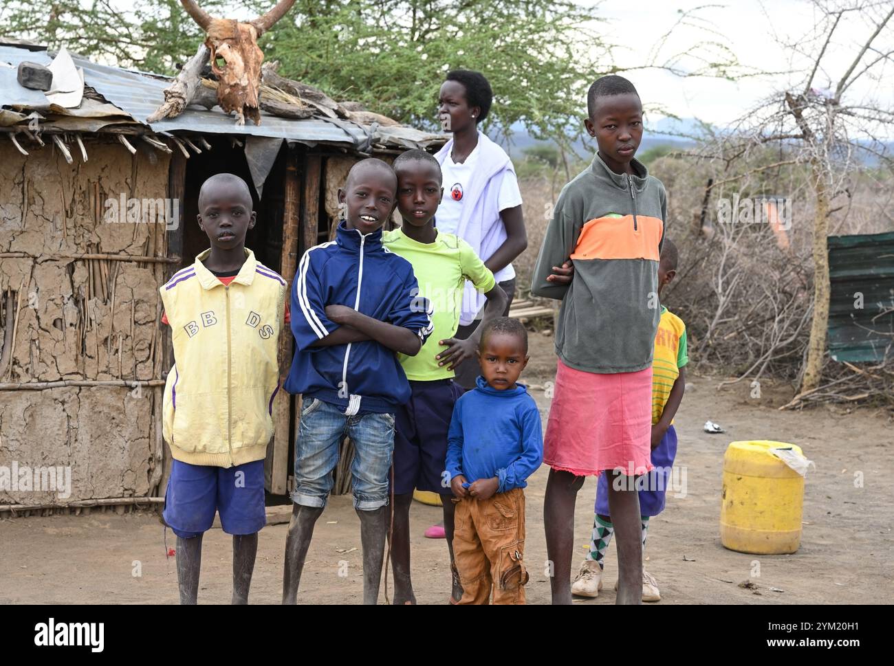 A SUBURB OF NAIROBI, KENYA - NOVEMBER 14, 2022: Poor African children ...