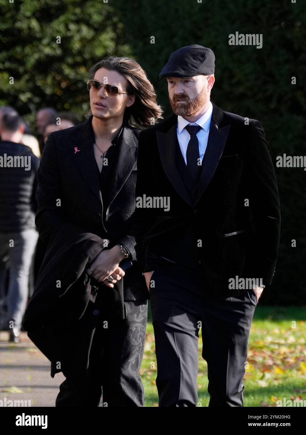 Damian Hurley (left) arrives for the funeral service of One Direction ...
