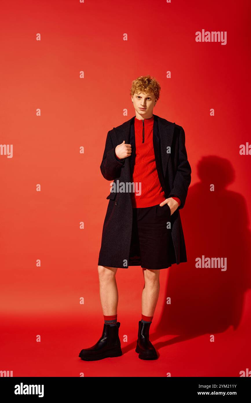 A stylish man showcases holiday fashion for 2025 with a striking red ...