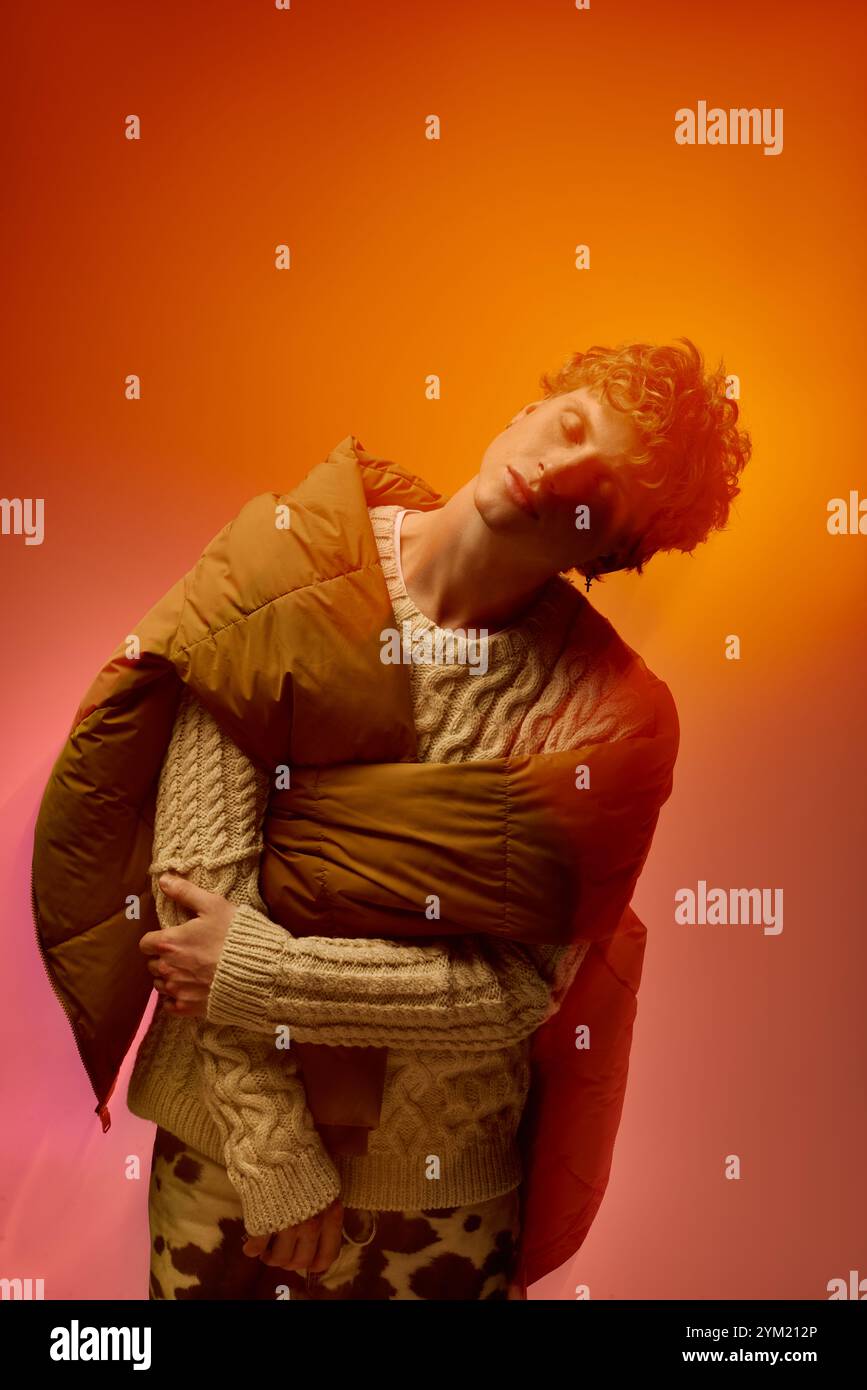 A stylish man showcases a creative holiday outfit featuring a cozy ...