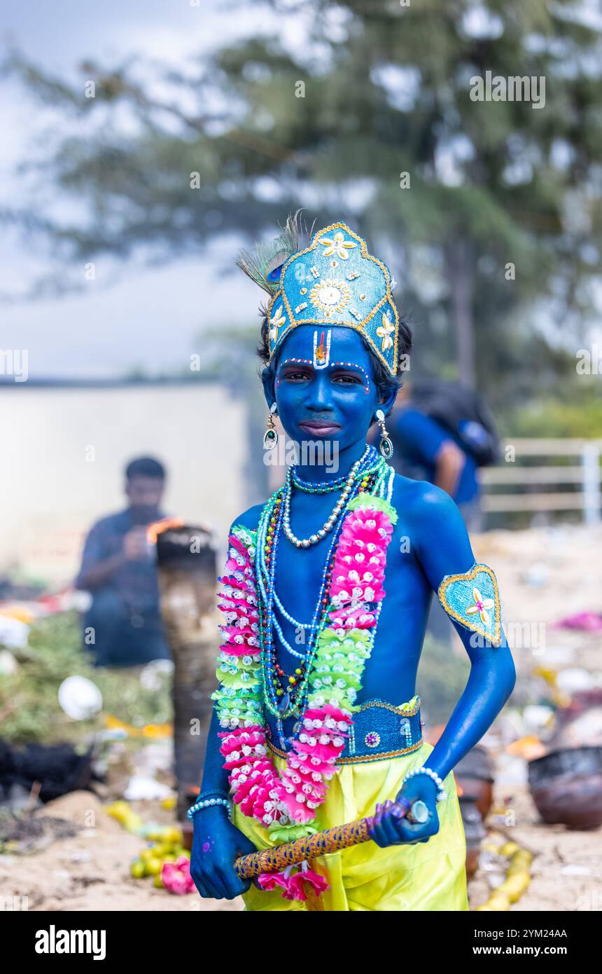 Kulasai Dasara, Portrait of indian hindu devotee with painted face and ...